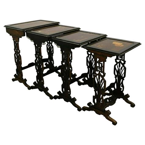 Set Of Four 20th Century Carved Chinese Nesting Tables With Fancy