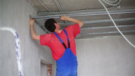 Man In Uniform Make Measurement For Set Ceiling Stock Video Video Of Accuracy Difficult