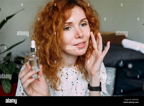 Young Curly Redhead Female Blogger Filming Daily Tutorial For Social