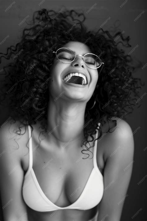 Woman Wearing Glasses And Bra Posing Premium Ai Generated Image