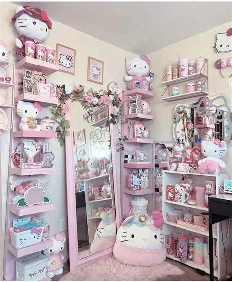 A Room Filled With Hello Kitty Toys And Other Items In Pinks Whites
