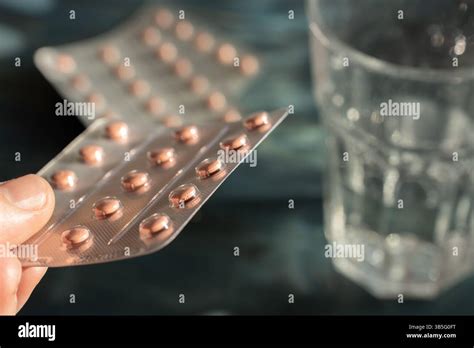 Self Medication Scene With Pharmaceutical Drugs On Blue Background