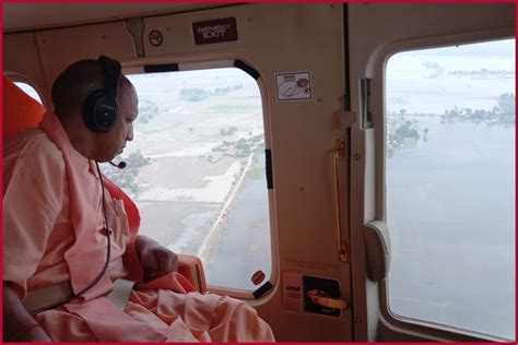Cm Yogi Conducts Aerial Survey Of Flood Hit Areas