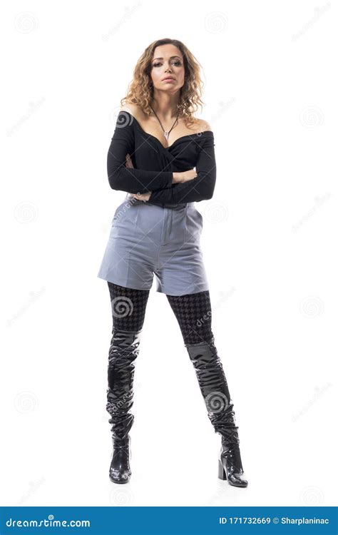 Cocky Attitude Brunette Curly Hair Fashionable Woman With Crossed Hands