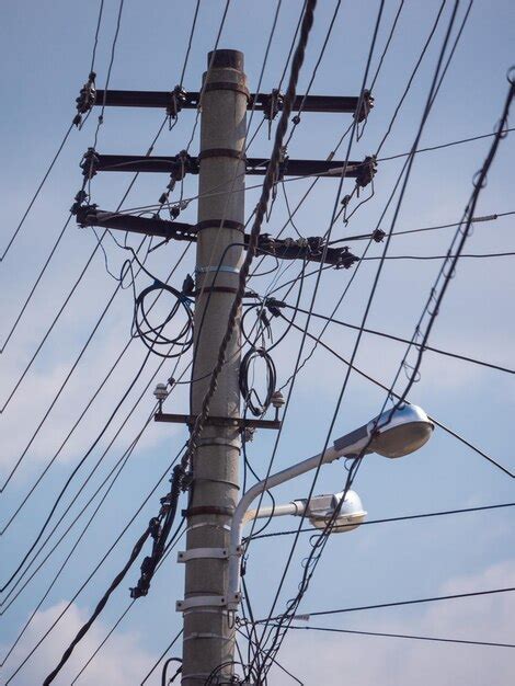 Premium Photo Electricity Pole With Many Wires