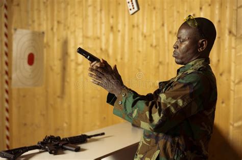 Man Reloading Firearm In Shooting Range Used To Train And Test Soldiers Stock Image Image Of
