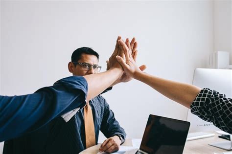 Premium Photo Happy Asian Business Team Making High Five Celebration