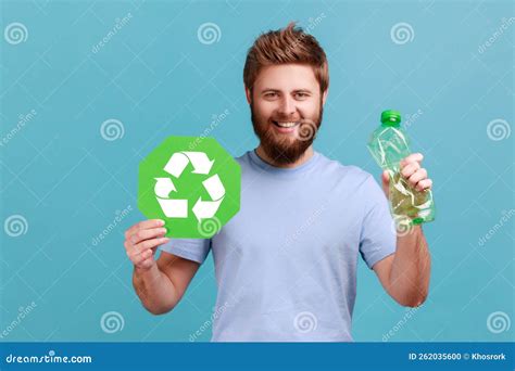 Man Pressing Bottle Holding In Hand Recycling Sign Board Plastic