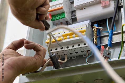 Fastening Circuit Breakers To Din Rail Of Consumer Unit Of Electrical Panel Mounting Fuse Box