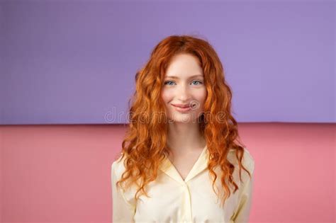 Portrait Of Young Beautiful Ginger Woman With Freckles Cheerfuly