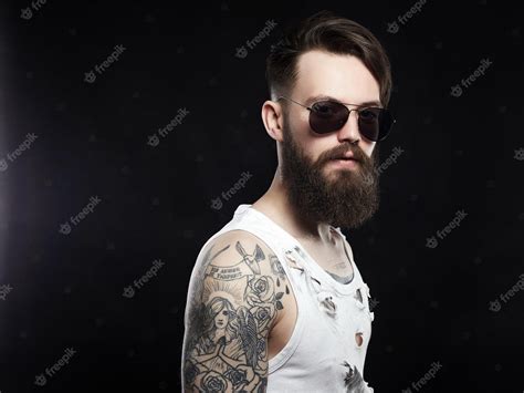 Premium Photo Handsome Man In Sunglasses Tattoo