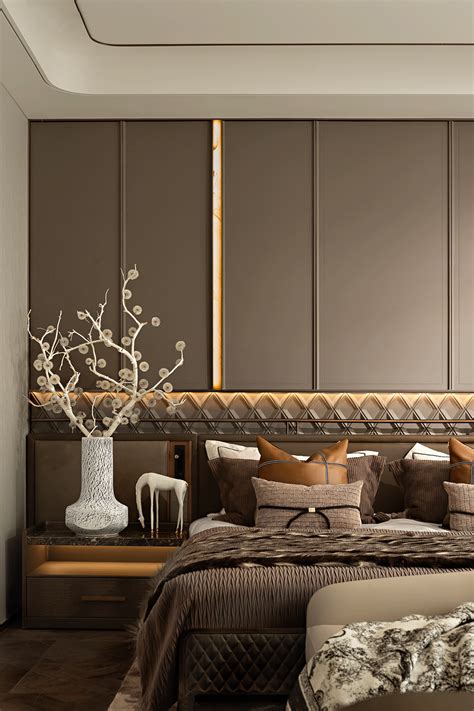 A Large Bed Sitting In A Bedroom Next To A Tall White Vase