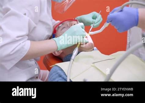 Person Undergoes A Medical Examination And Treatment Of The Oral Cavity
