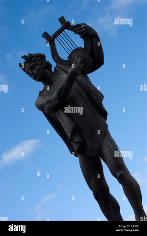 Statue Of Apollo Playing Cithara Or Kithara In The Old Market Square