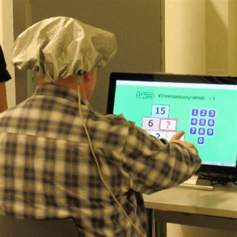 Nirs Device Being Used For An Elderly Person Form The Finnish Test