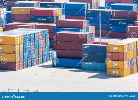 View Of Various Containers Stored In The Container Terminal Near Water