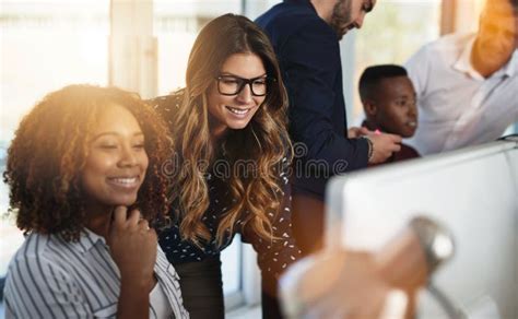 Collaboration Produces Better Outcomes Two Designers Working Together On Something On A