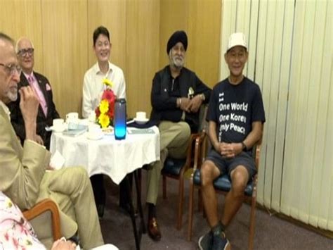 Indian Consul General To Republic Of Korea Meets Marathoner Running For