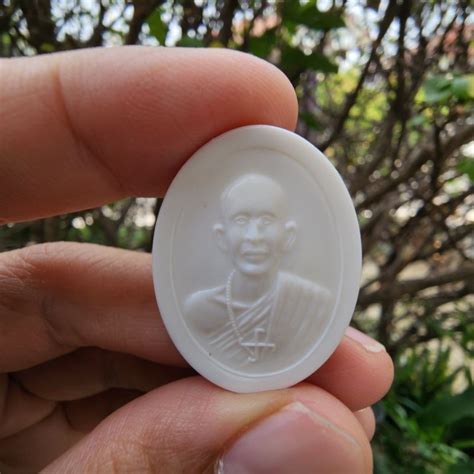 เหรียญพลาสติก หลวงพ่อโอภาสี วัดหลวงพ่อโอภาสี กทม รุ่นฉลองวิหารโป๊ยเซียน ปี 2555 ประกันแท้ตู้วัด