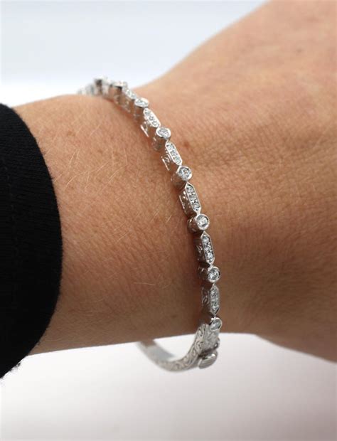 Penny Preville 18 Karat White Gold And Diamond Hinged Bangle Bracelet
