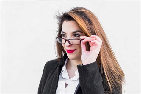 Free Photo Business Woman Adjusting Glasses