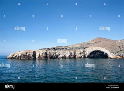 Sea Cave Eroded Into Tuff Cliff Compacted Volcanic Ash On Isabela