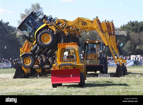 Jc Balls Jcb Digger Dance Display Team At The Cromford Steam Rally Derbyshire England Uk