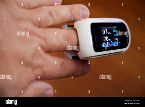 Pulse Oximeter Reading SpO And Pulse Rate Stock Photo Alamy