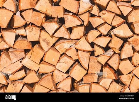 Stack Of Wood Logs Preparation Of Firewood For The Winter Pile Of