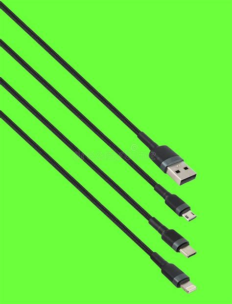 Cable With Usb Micro Usb Lightning And Type C Connector On A Green Background Stock Image