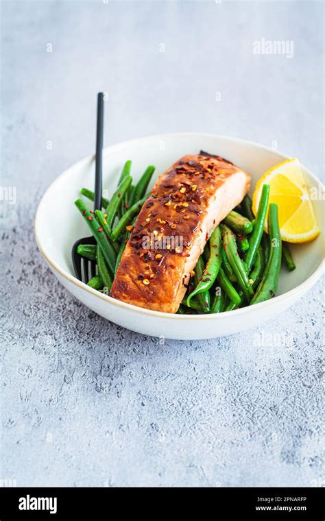 Spicy Teriyaki Salmon With Green Beans Asian Cuisine Recipe Stock