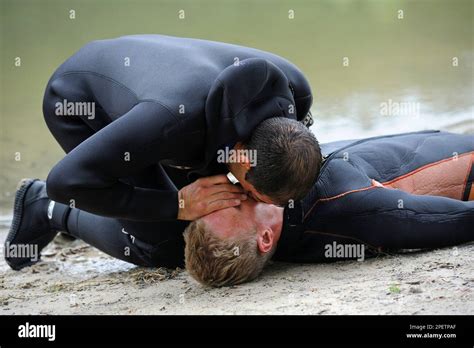 Lesson Of Artificial Respiration Lifeguard Giving Drowning Mouth To Mouth Resuscitation Stock