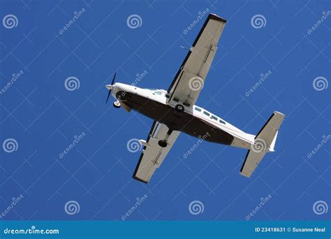 Closeup Of Airplane Belly In Blue Sky Stock Image Image Of Plane
