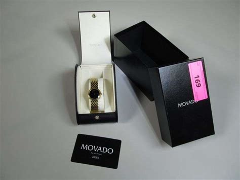 MOVADO STAINLESS STEEL GOLD PLATED BLUE CIRCLE FACE WATCH Bentley Associates LLC