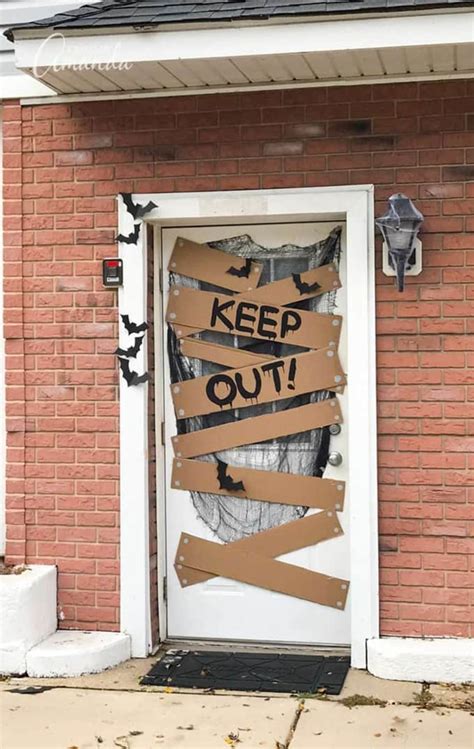 35 Halloween Door Decorations For DIYers