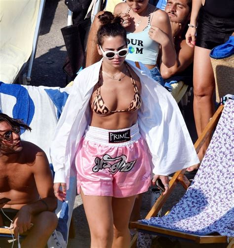 Dua Lipa In Bikini Top Sunbathing On Summer Holiday In Capri 0829