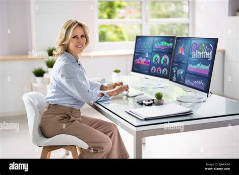 Analyst Woman Looking At Business Data Analytics Dashboard Stock Photo Alamy