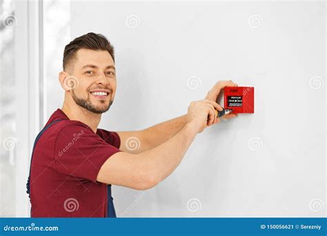 Electrician Installing Fire Alarm System Stock Image Image Of Person