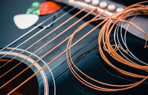 Coated Vs Uncoated Guitar Strings Which Is Best Teds List