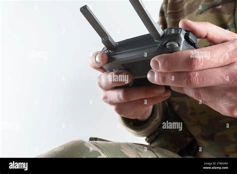 Soldier In Military Uniform Holding Drone Remote Control Close Up Concept Of Drones In Modern