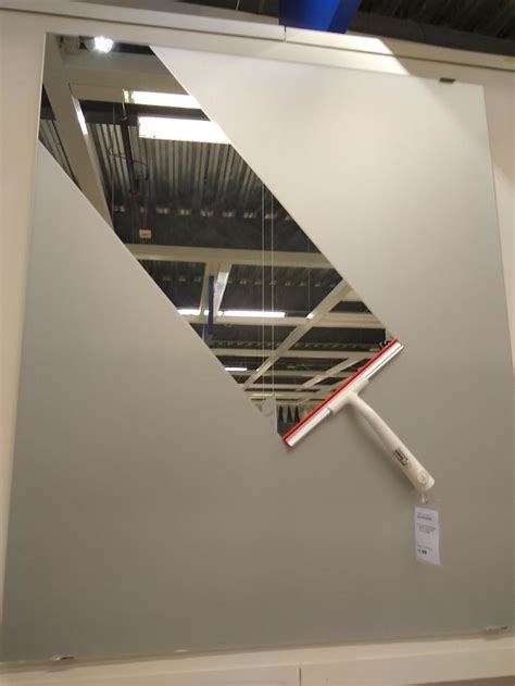 This Frosted Mirror Display For A Squeegee At IKEA Window Display