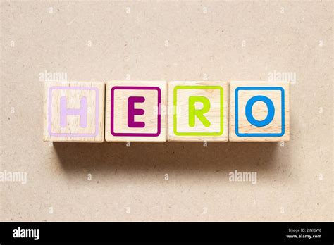 Color Letter Block In Word Hero On Wood Background Stock Photo Alamy
