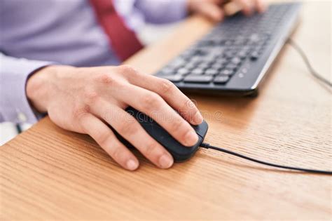 Young Hispanic Man Business Worker Touching Computer Keyboard Using