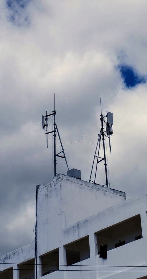 Cellular Network Antennas On Top Of White Building Stock Image Image