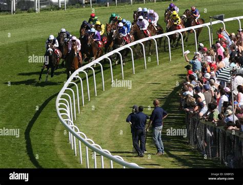 Dylan Thomas And Jockey Johnny Murtagh Right And Dragon Dancer And Jockey Daryll Holland Left
