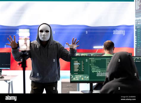Anonymous Person With Mask Asks For Ransom In Russian Governmental Hacking Room With The