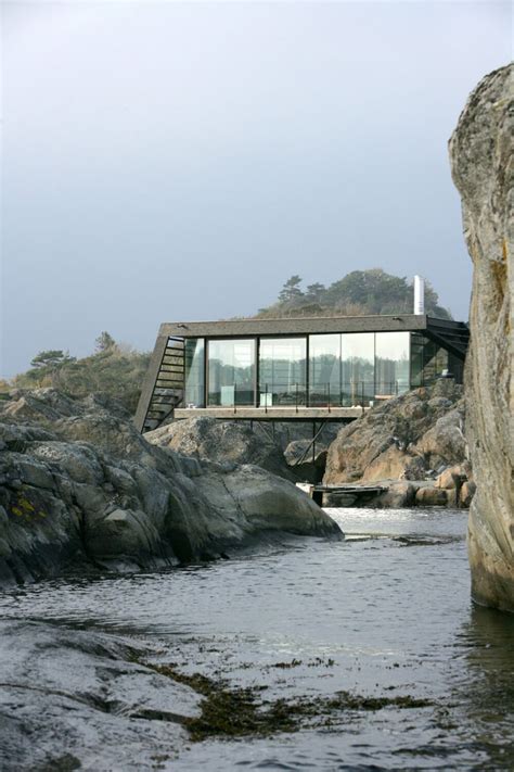 Glass Walled House Placed In The Rocky Landscape Of Norway Freeyork