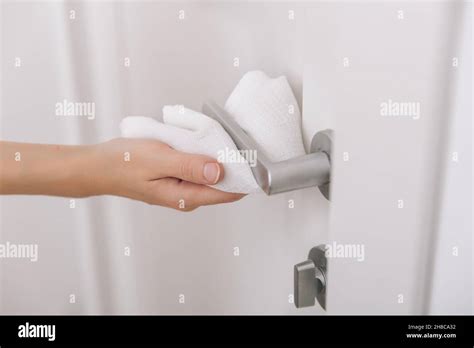 Cleaning Black Door Handles With An Antiseptic Wet Wipe Sanitize Surfaces Prevention In