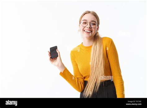 Attractive Young Blonde Woman Wearing Sweater Standing Isolated Over