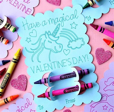 Some Crayons Are Laying On Top Of A Pink Background With Unicorns And